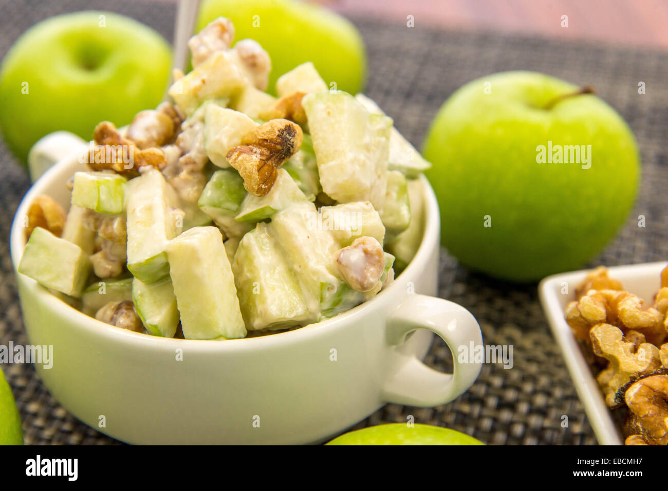 green apple and walnut salad with condensed milk Stock Photo - Alamy