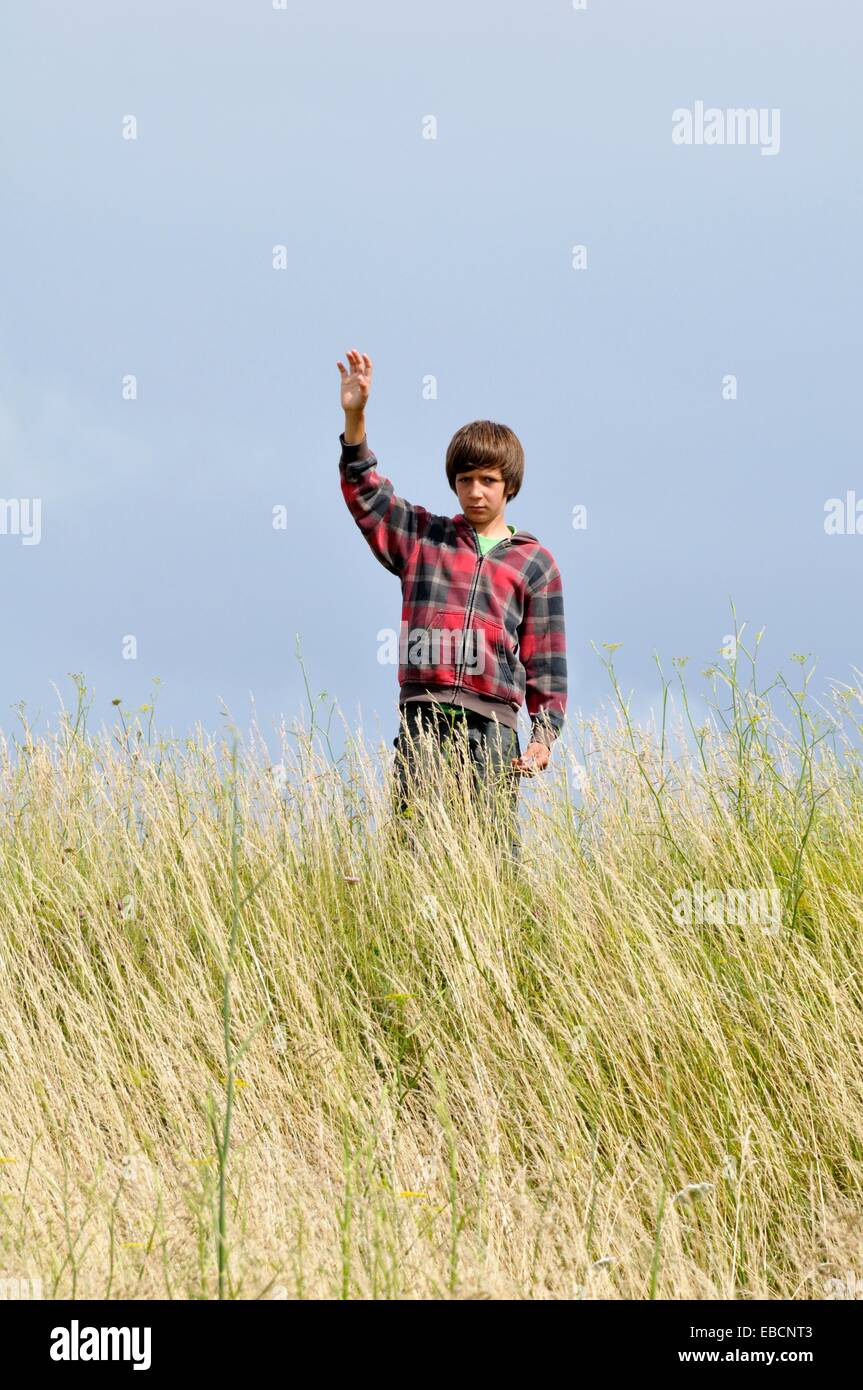 Boy says hello Stock Photo - Alamy