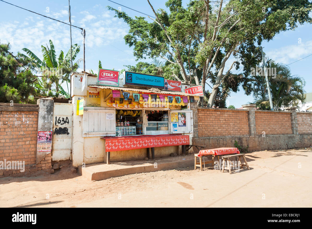 Small roadside snack bar and general grocery store with table and ...