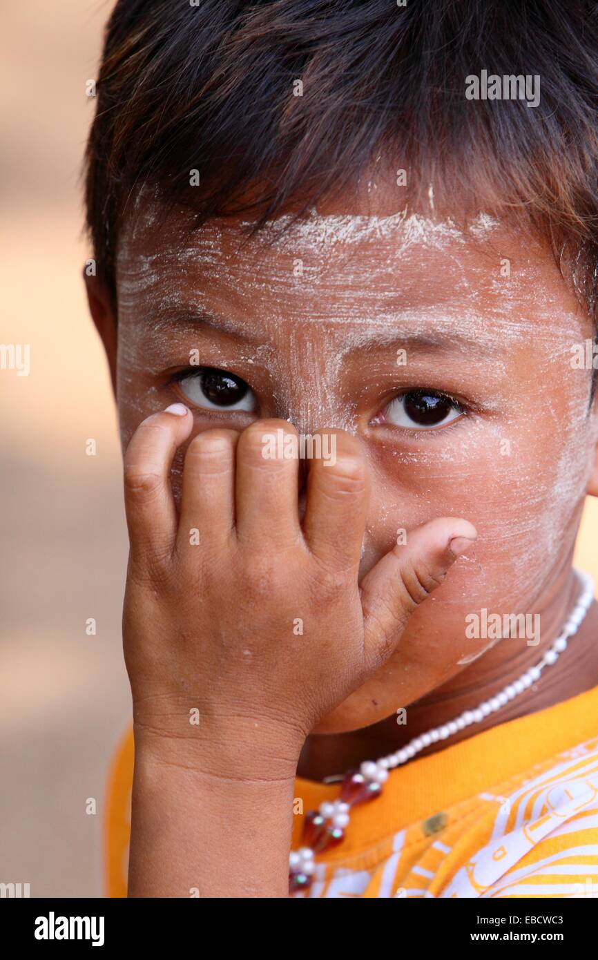 Young girl with thanaka face paint Bagan Mandalay Division Myanmar ...