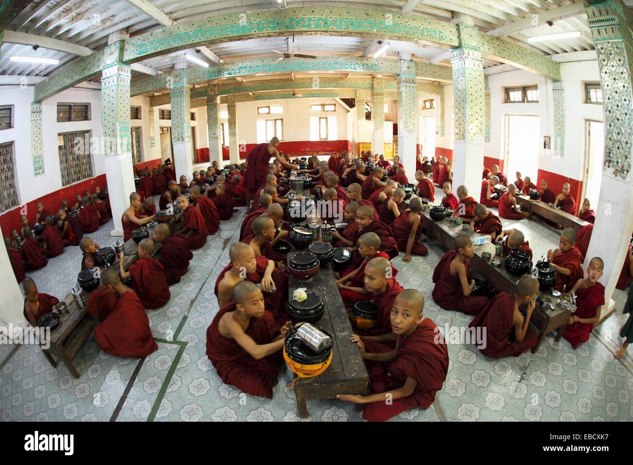 Novice monk eating hi-res stock photography and images - Alamy