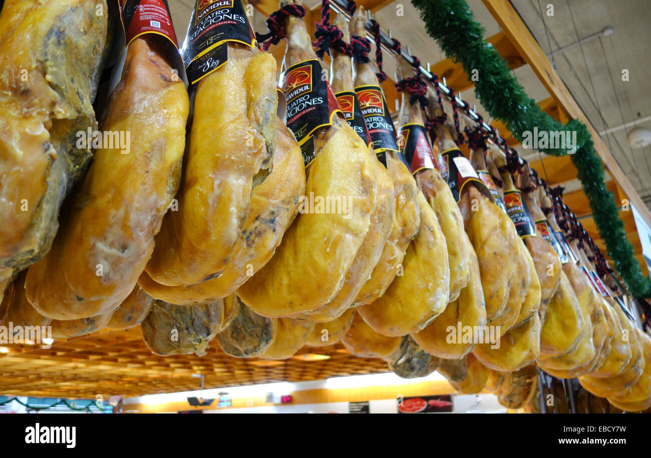 A display of different brands of Spanish Ham, Jamon Serrano in a ...