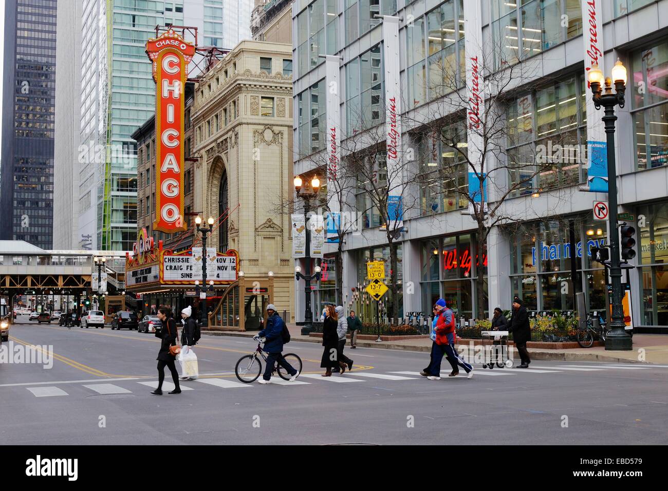 Chicago Theater on State Street with pedestrians in crosswalk Stock ...