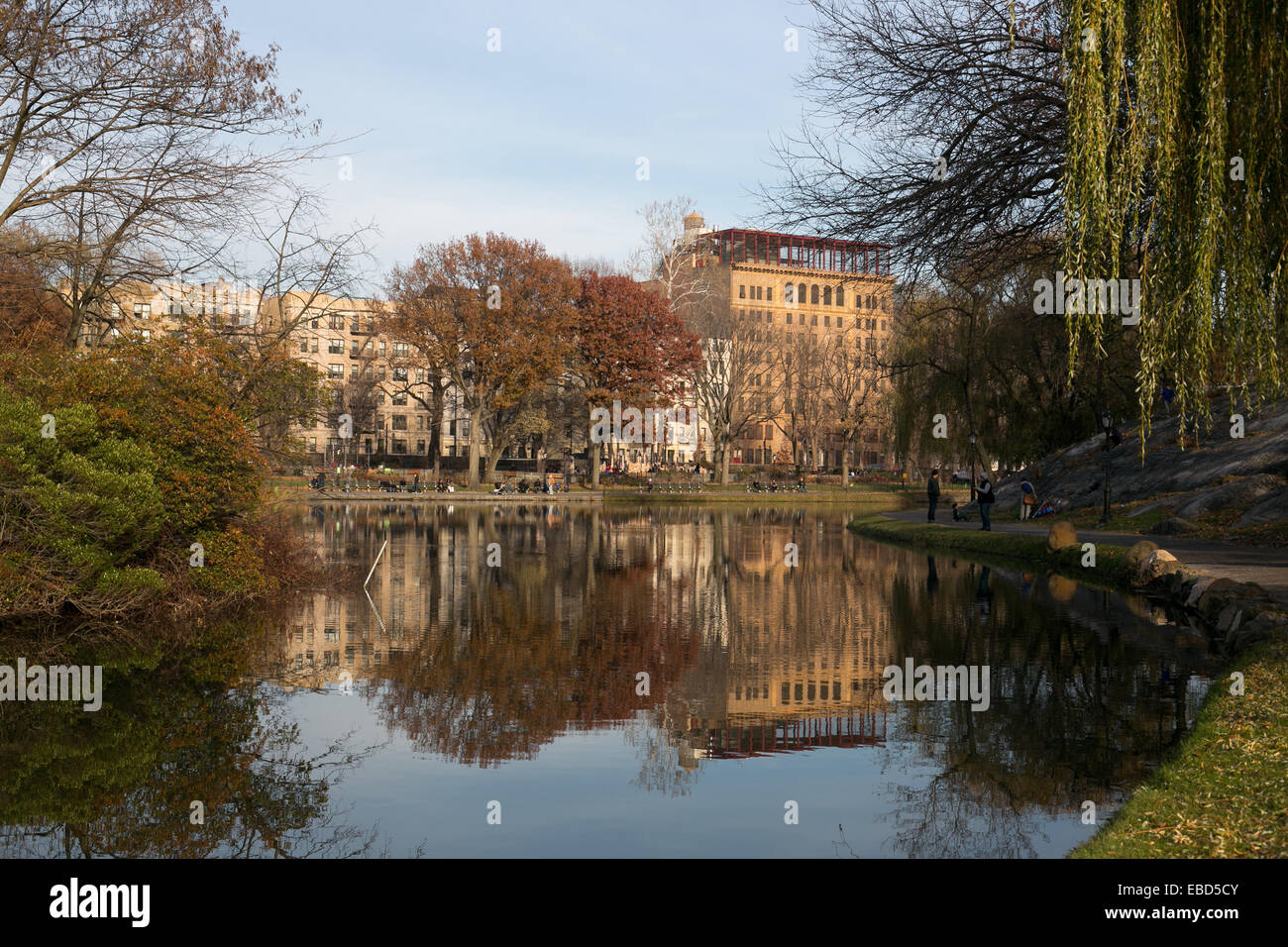 A reflection of the buildings on the Harlem Meer (lake) in northern ...