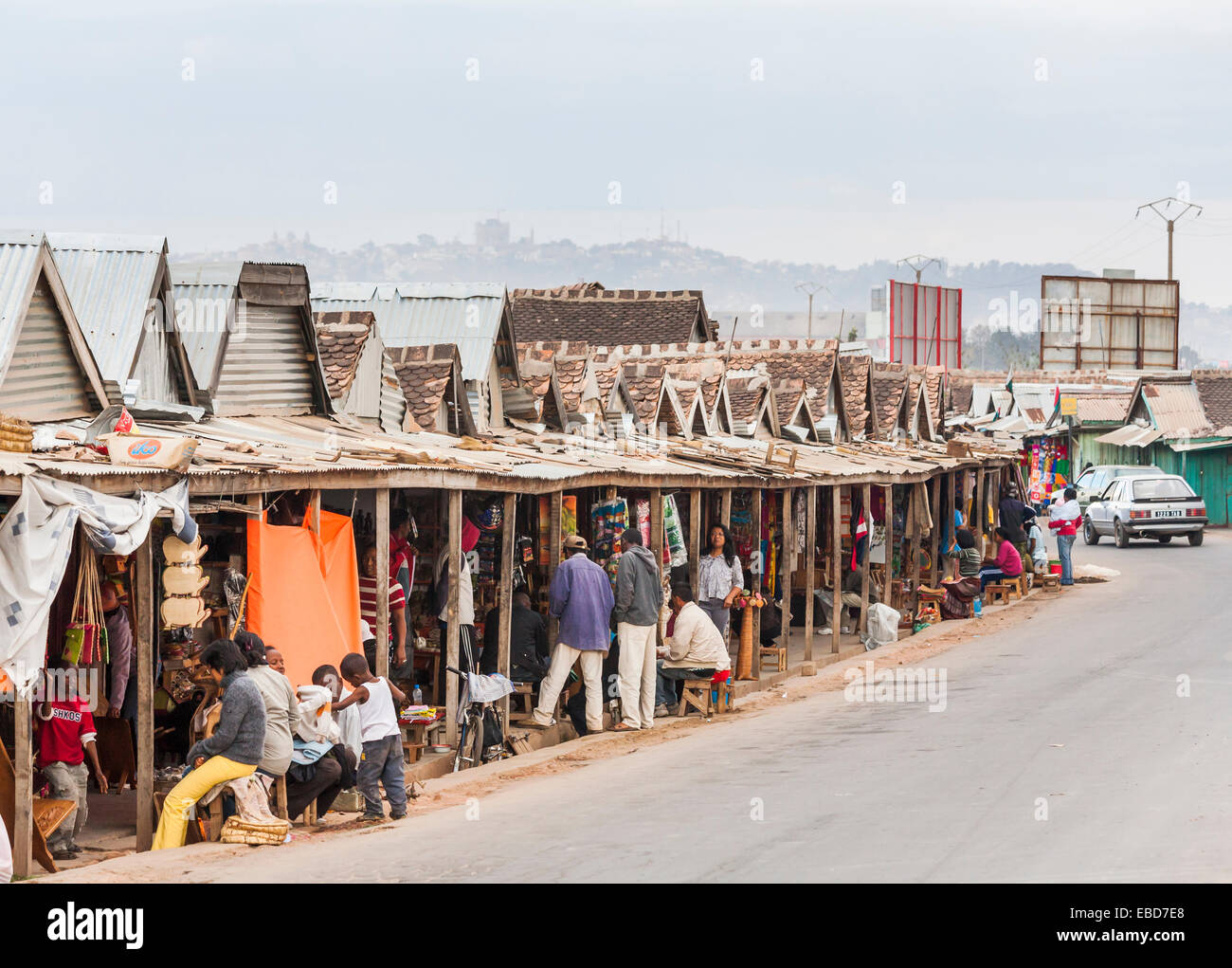 Shops with local African people selling tourist souvenirs in a shanty ...
