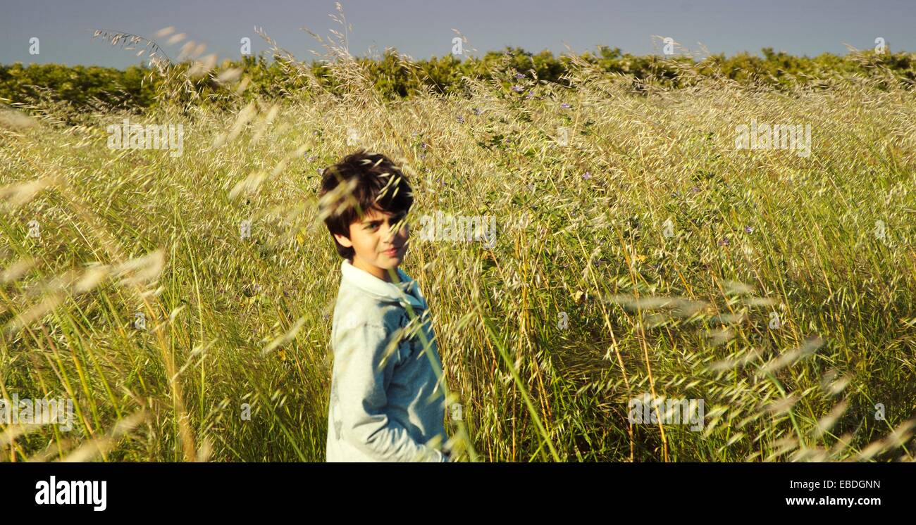 Child in the field Stock Photo - Alamy