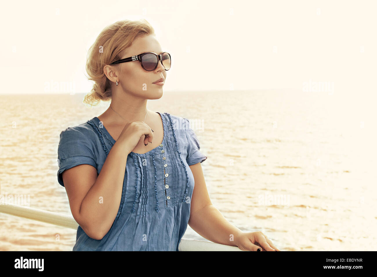 Portrait of nice young woman having good time on sea view back Stock ...