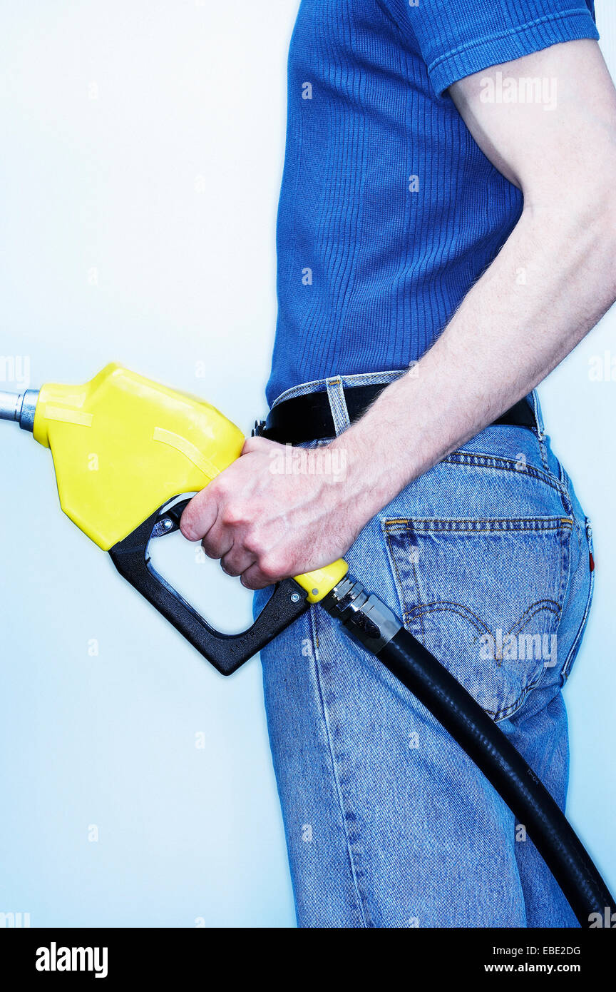 Man Holding Gas Pump Head High Resolution Stock Photography and Images ...