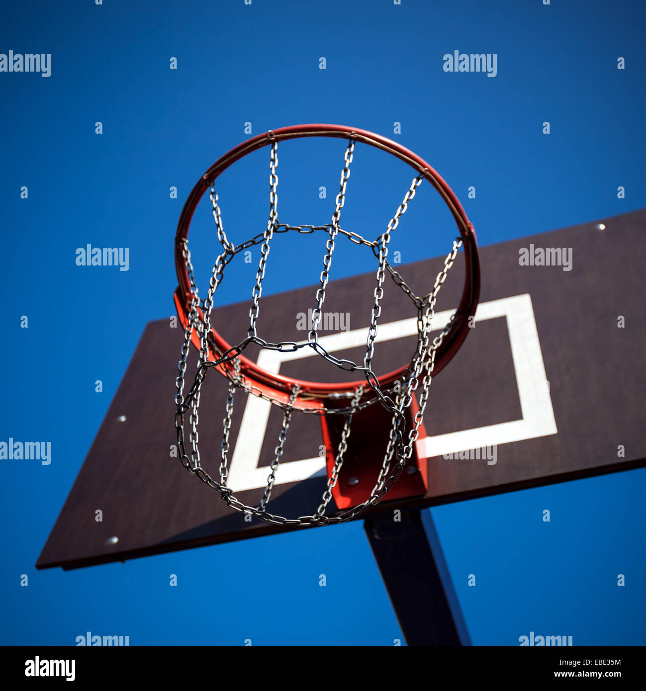 Basketball hoop on a blue sky background Stock Photo - Alamy