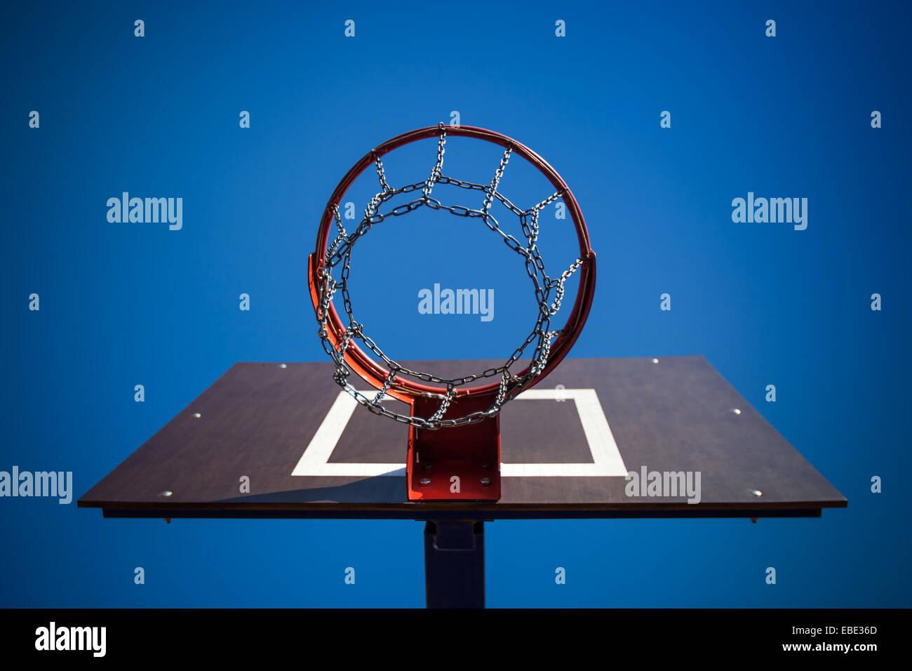 Basketball hoop on a blue sky background Stock Photo - Alamy