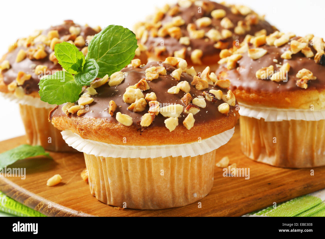 Hazelnut muffins with chocolate topping Stock Photo - Alamy