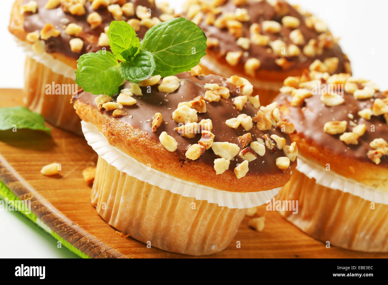 Hazelnut muffins with chocolate topping Stock Photo - Alamy