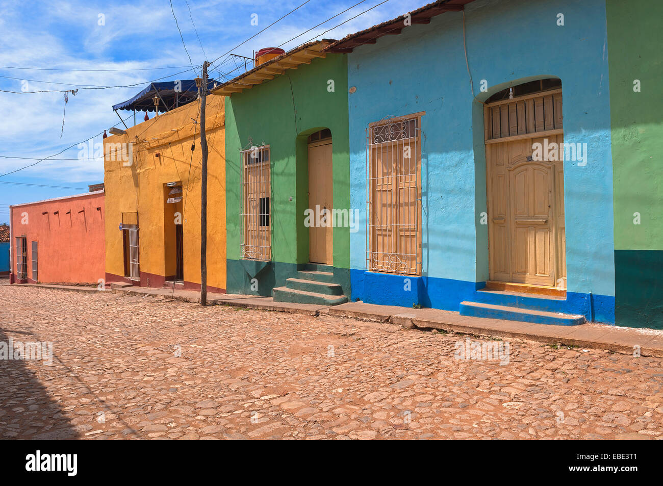 Colorful buildings, street scene, Trinidad, Cuba, West Indies ...