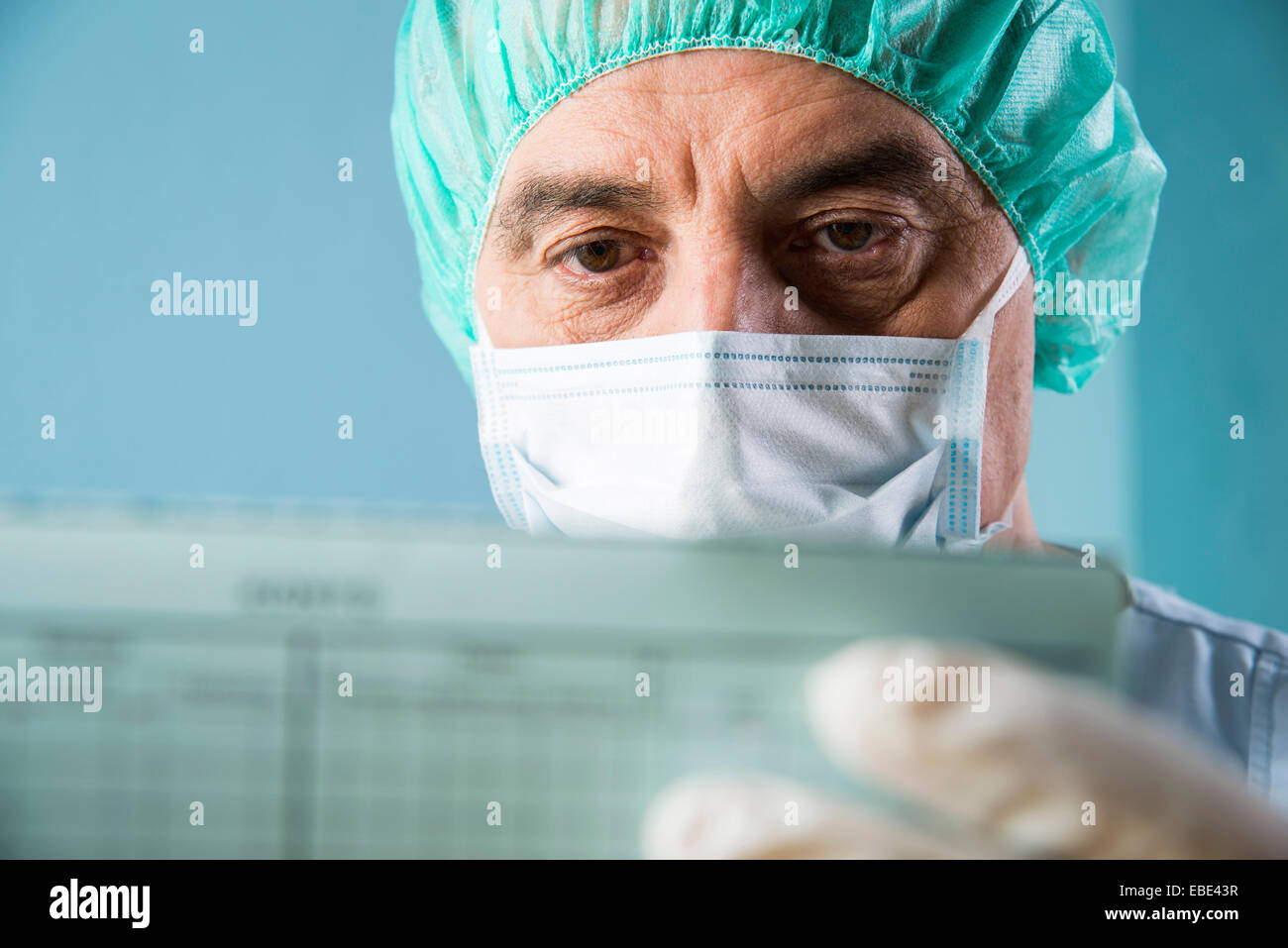 Close-up of Surgeon looking at Medical Chart Stock Photo - Alamy