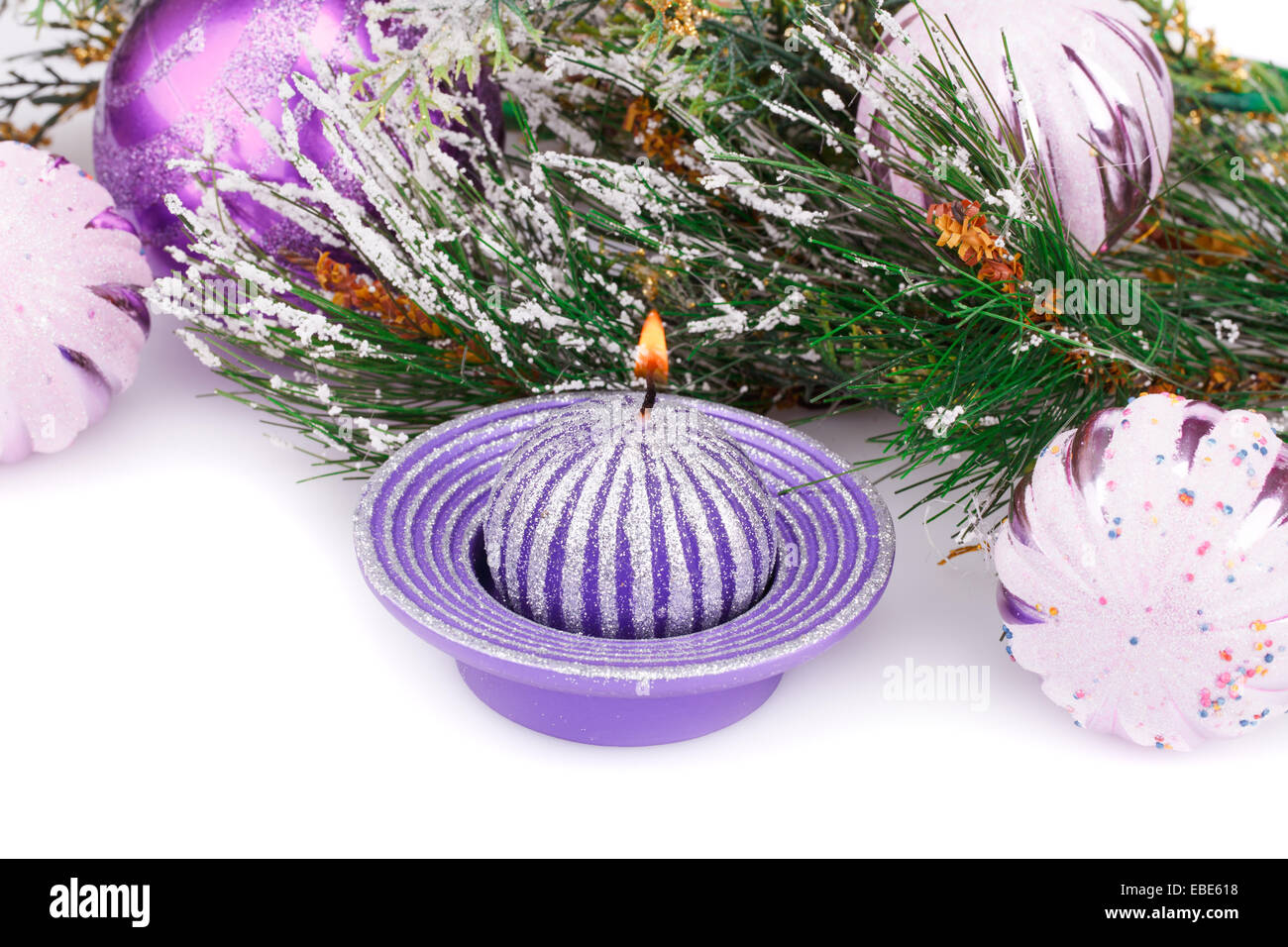 Christmas pink balls, candle and fir tree on white background Stock ...