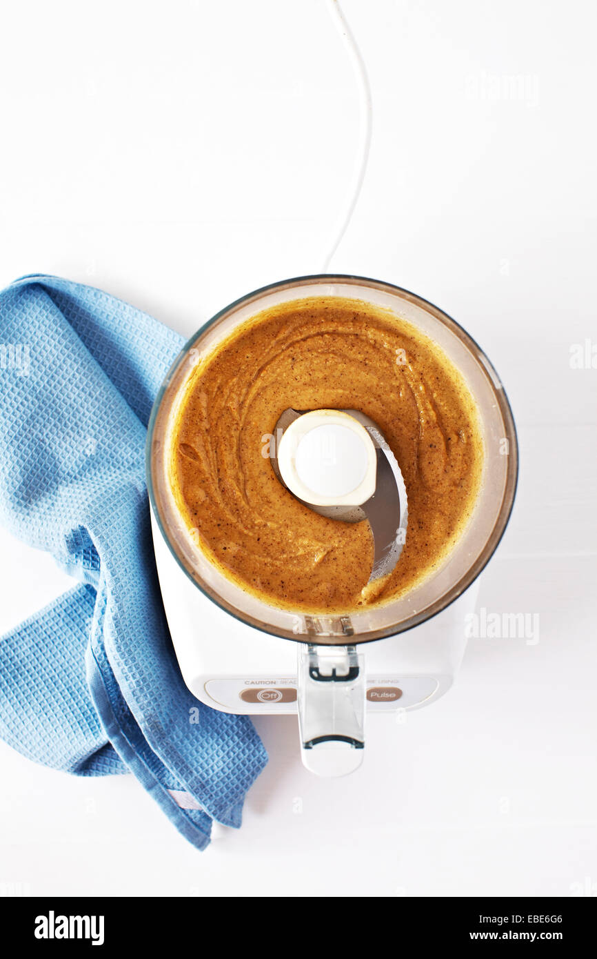 Overhead View of Food Processor with Paste inside on White Background ...