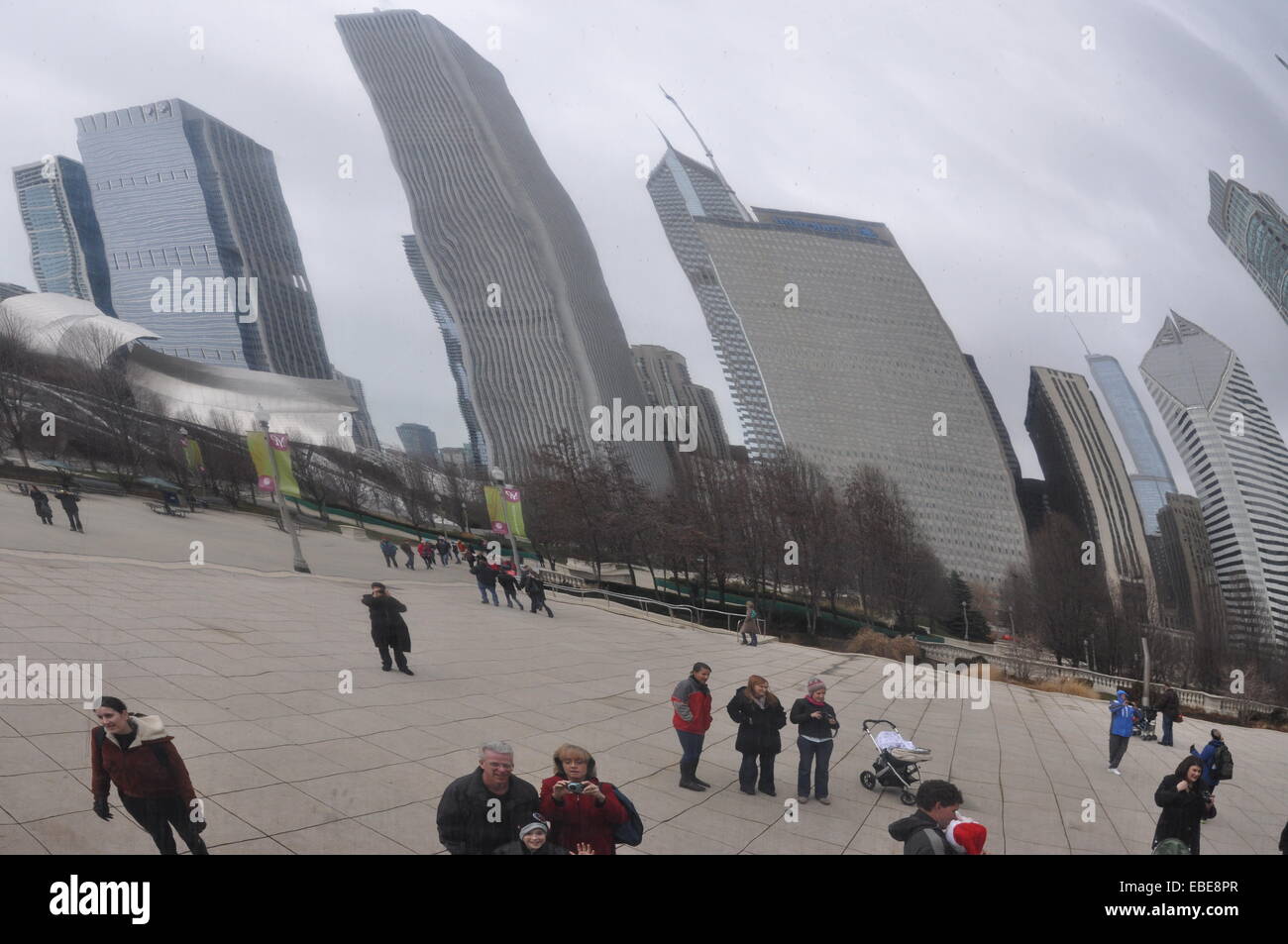 Distorted reflection of Chicago skyline on Cloud Gate, a stainless ...