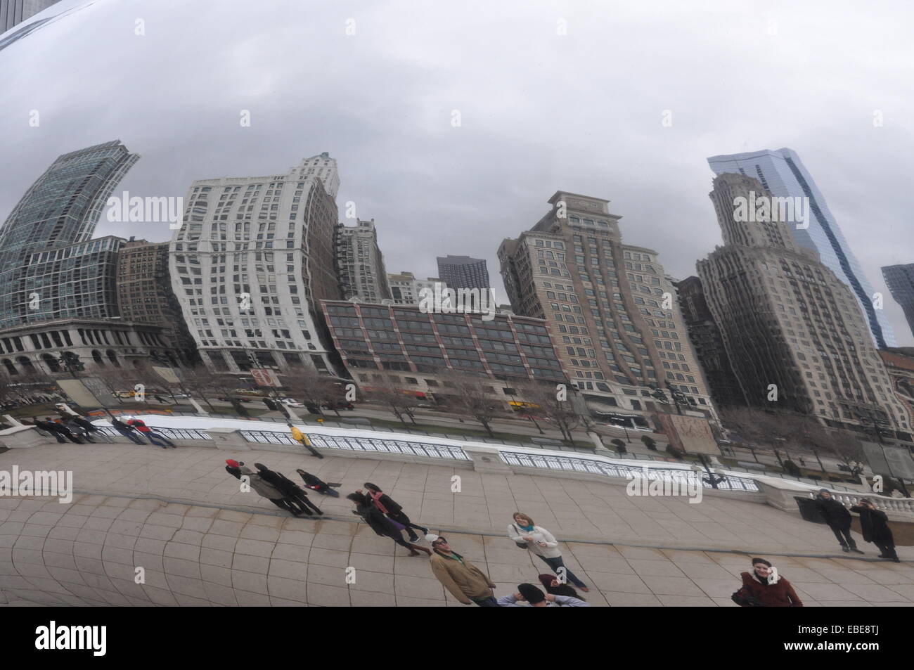 Distorted reflection of Chicago skyline on Cloud Gate, a stainless ...