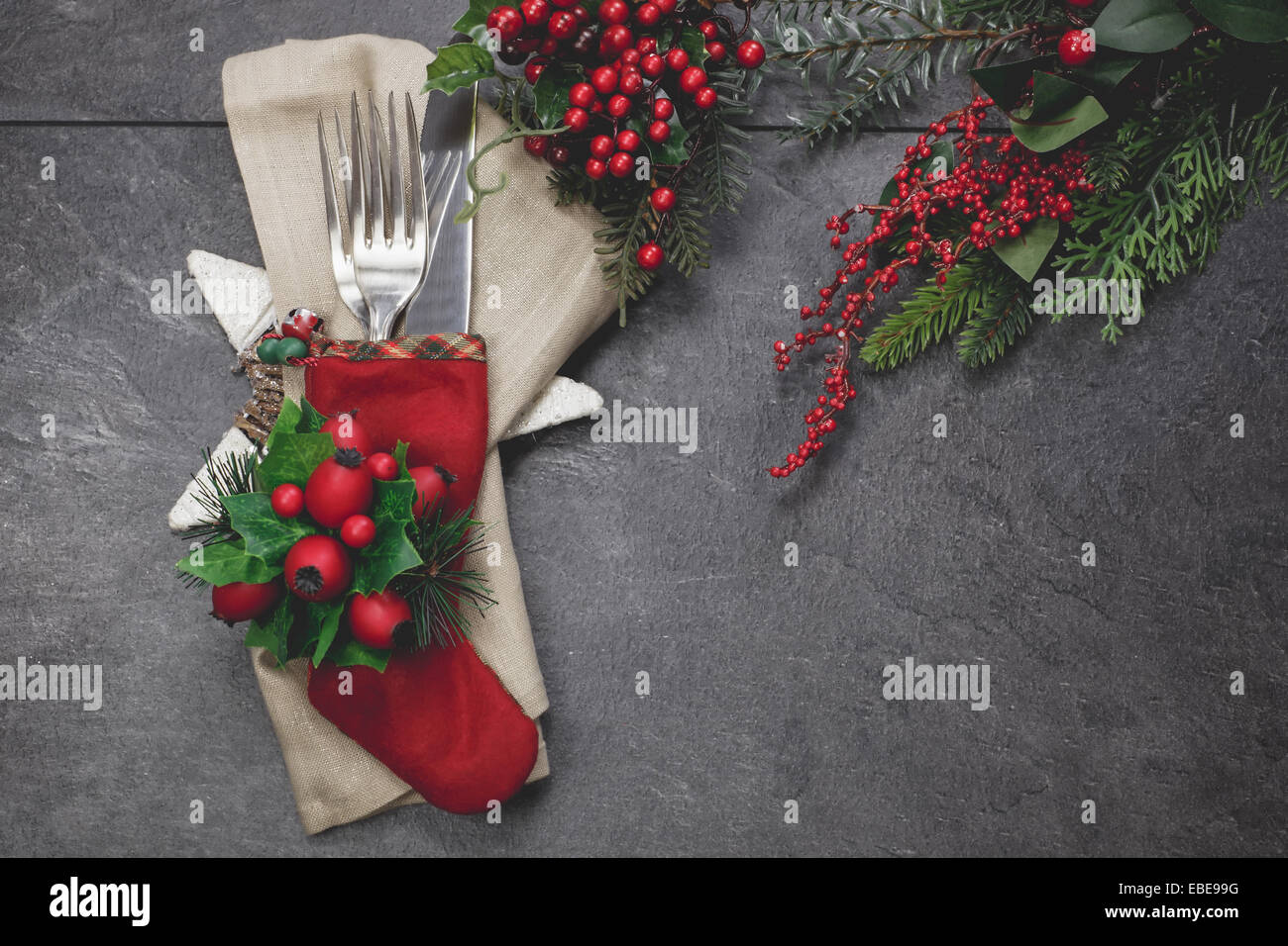 Holiday place setting. Christmas stocking place settings with festive ...