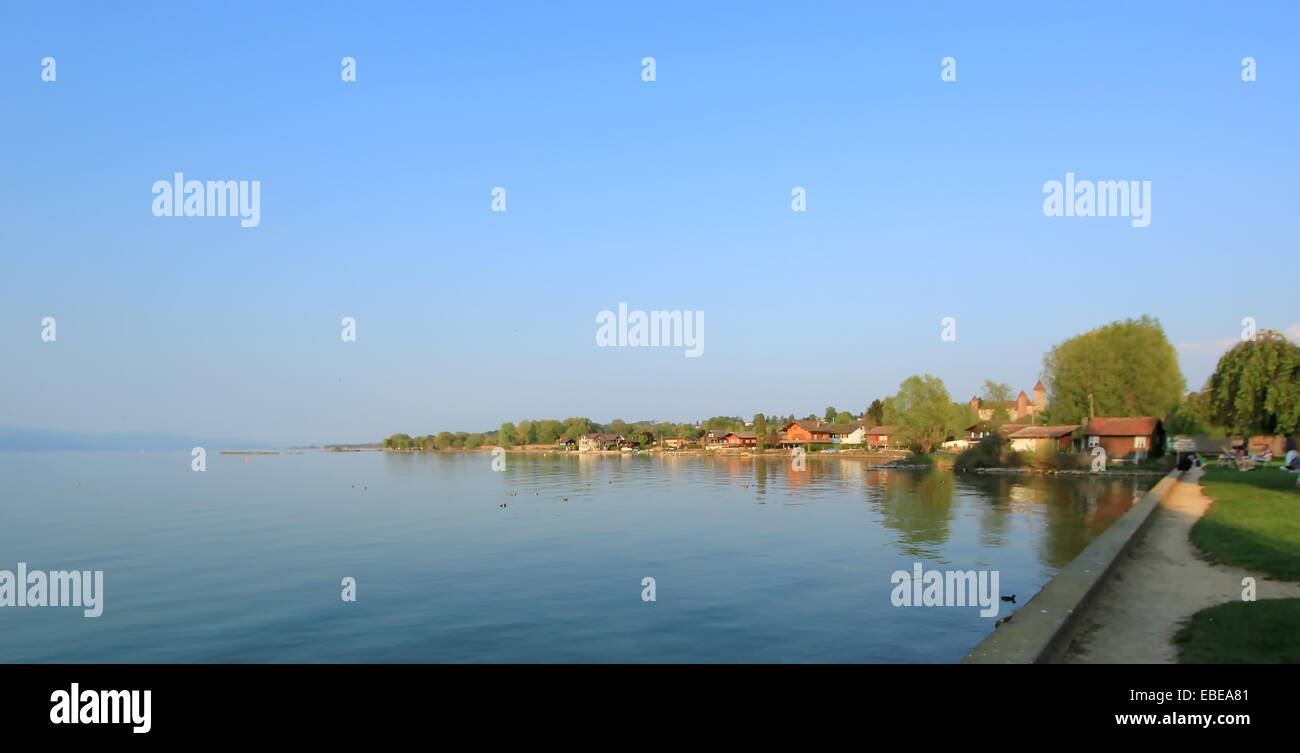 Estavayer-le-lac lake side with its famous castle by sunset ...