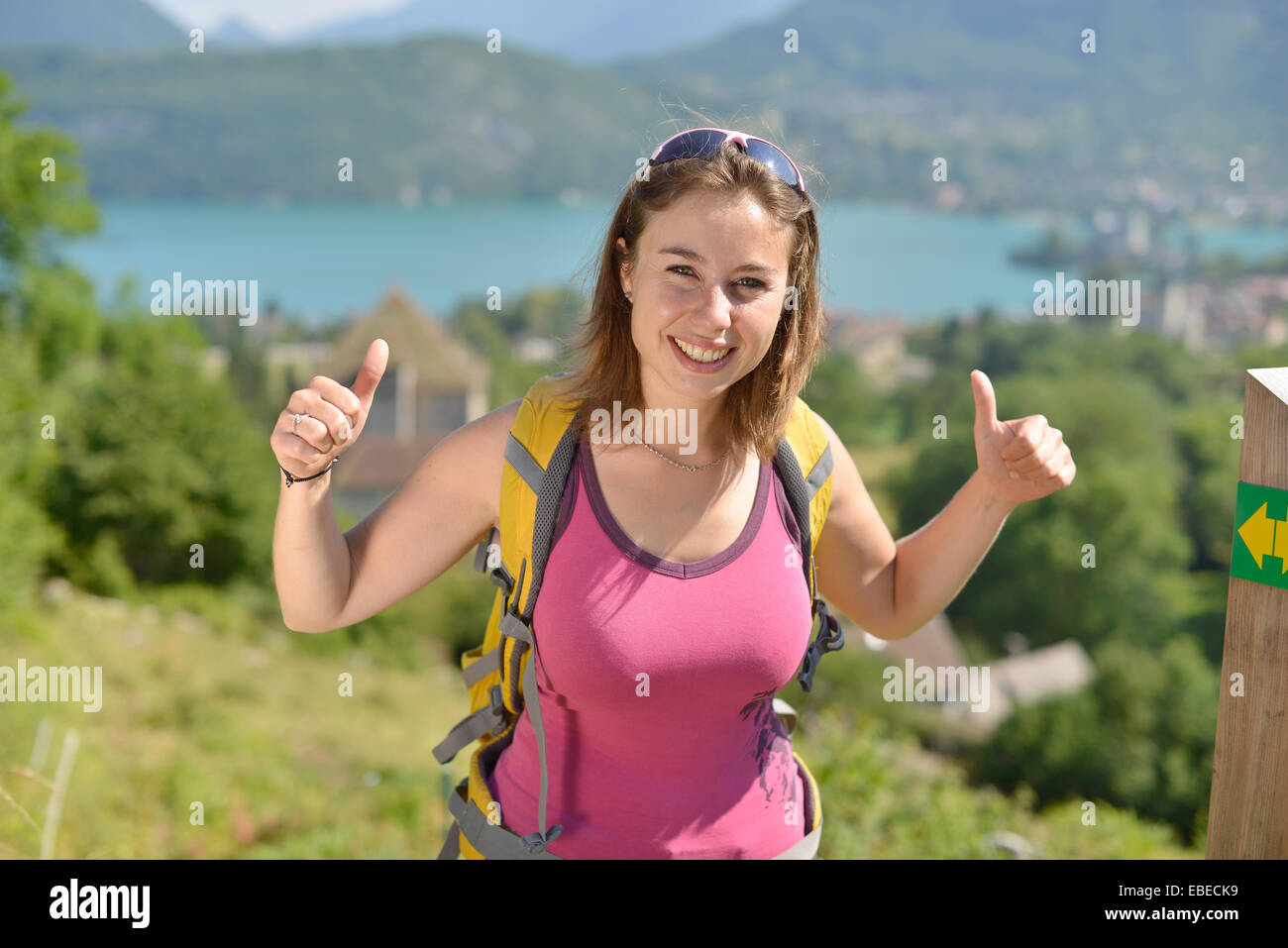 pretty young woman is hiking in the French Alps Stock Photo - Alamy