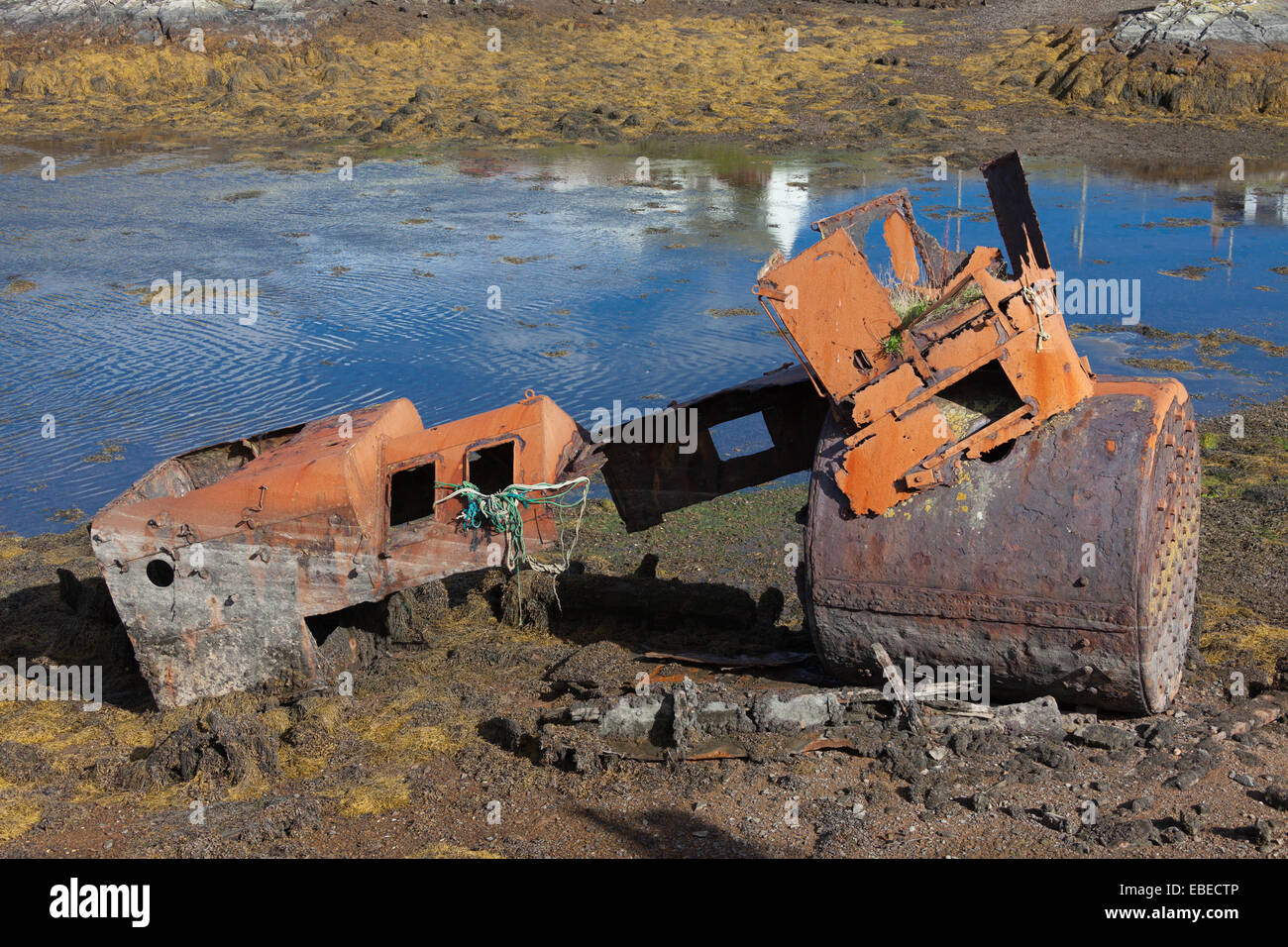 Rusty boiler on the shoreline in Isle of Scalpay, near Harris, Scotland ...