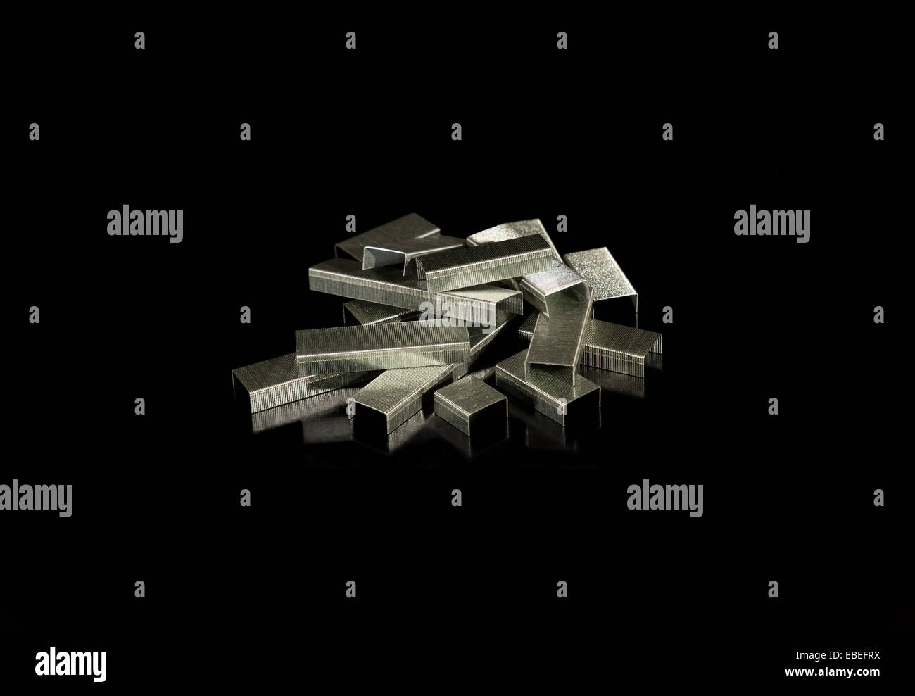 A closeup to a pile of silver staples Stock Photo - Alamy