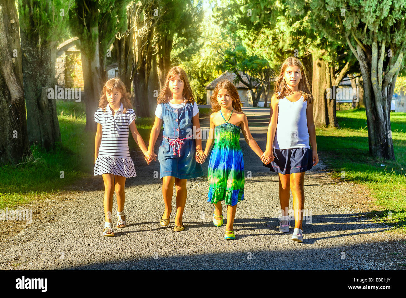 Girls walking hi-res stock photography and images - Alamy