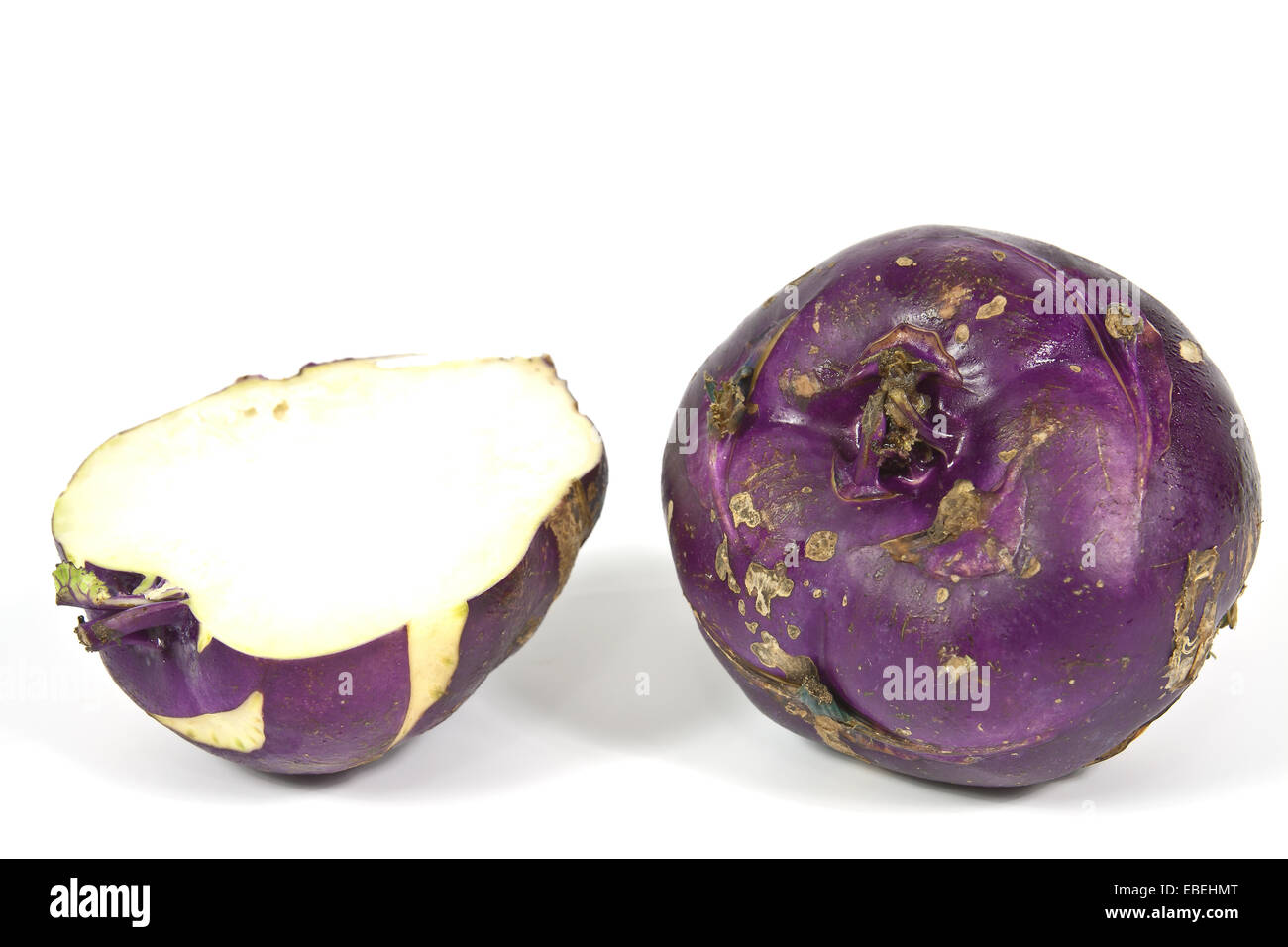 Kohlrabi vegetable with a rounded stem with dark purple color on a ...
