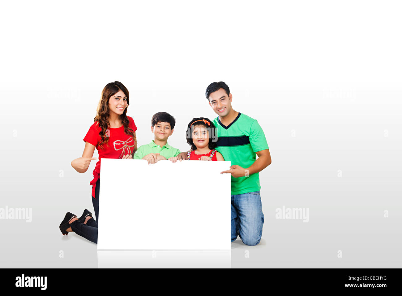 indian Family Showing Message Board Stock Photo - Alamy