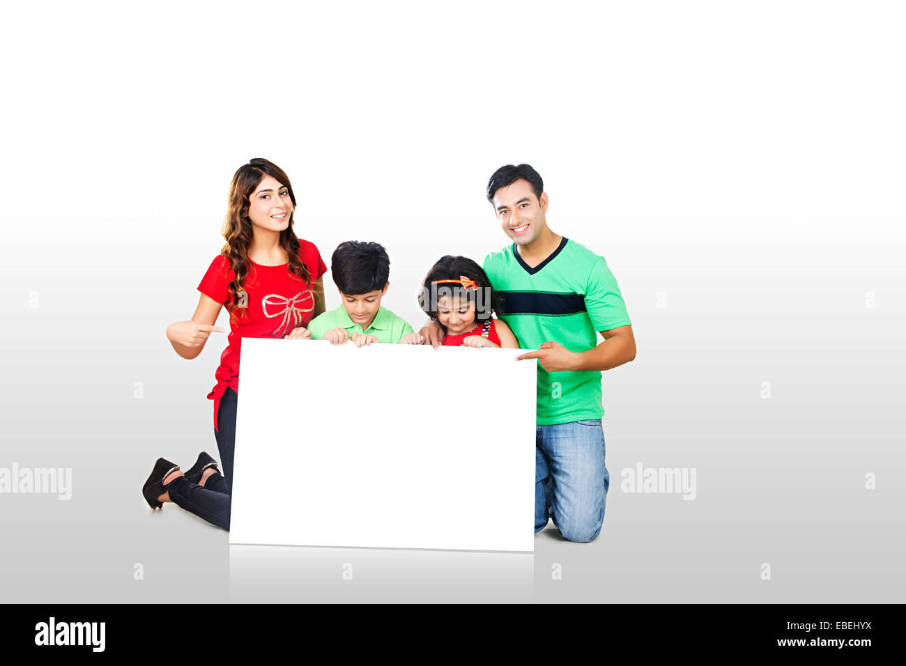 indian Family Showing Message Board Stock Photo - Alamy