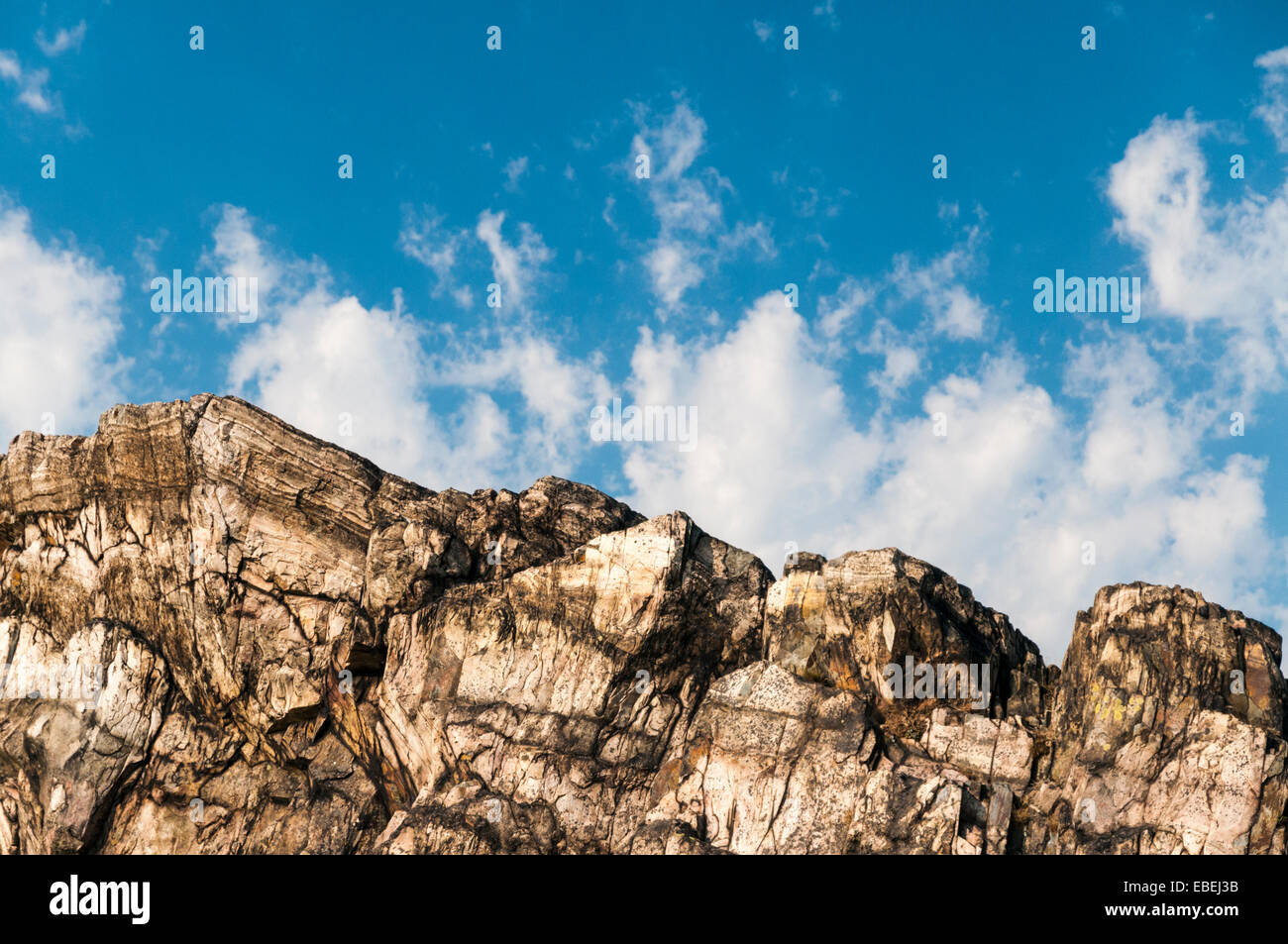 Epiclastic volcanic rock formations against a blue sky at Beacon Hill ...