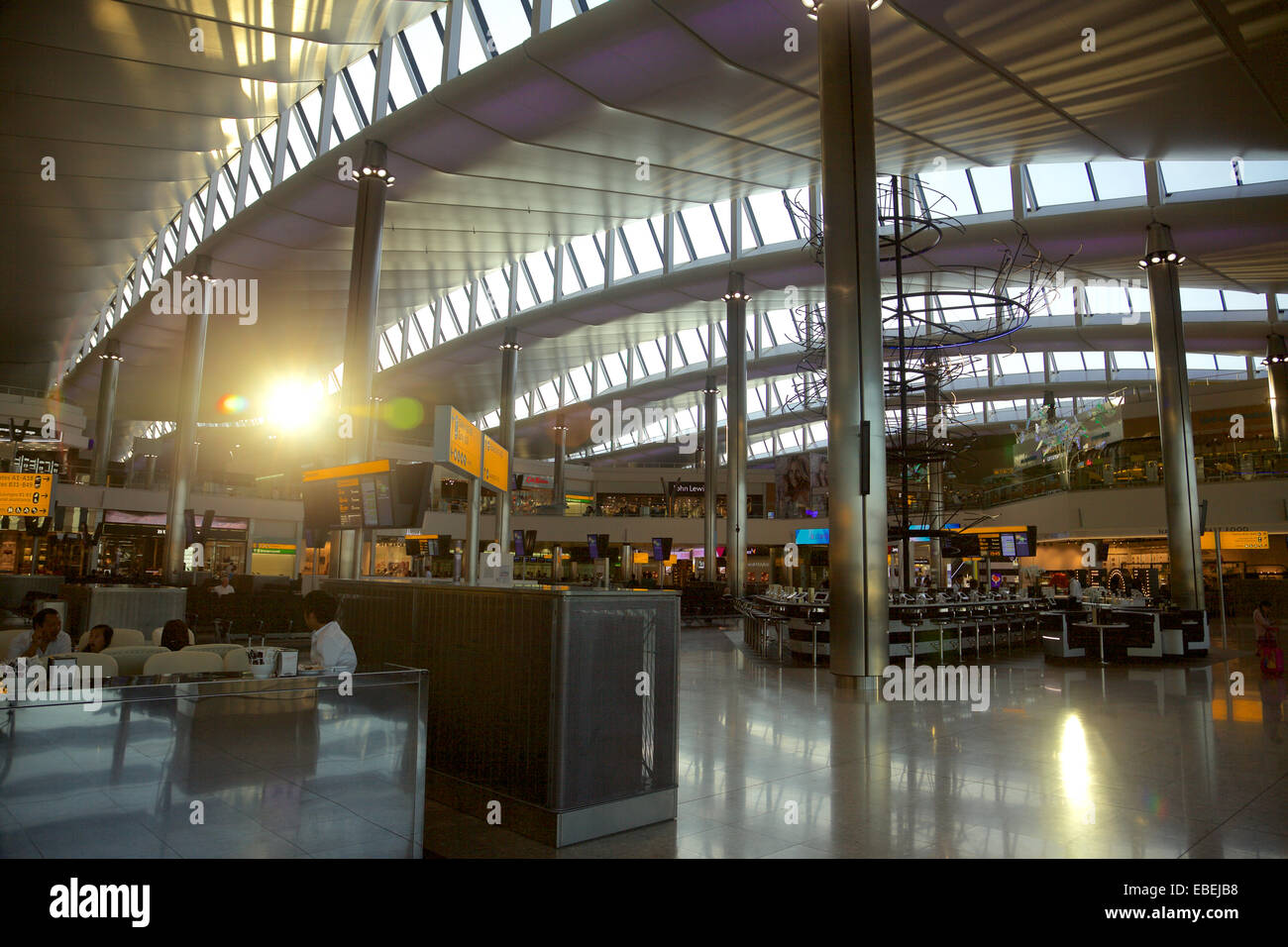 The sun shinning on the roof and windows of the new terminal 2 building ...