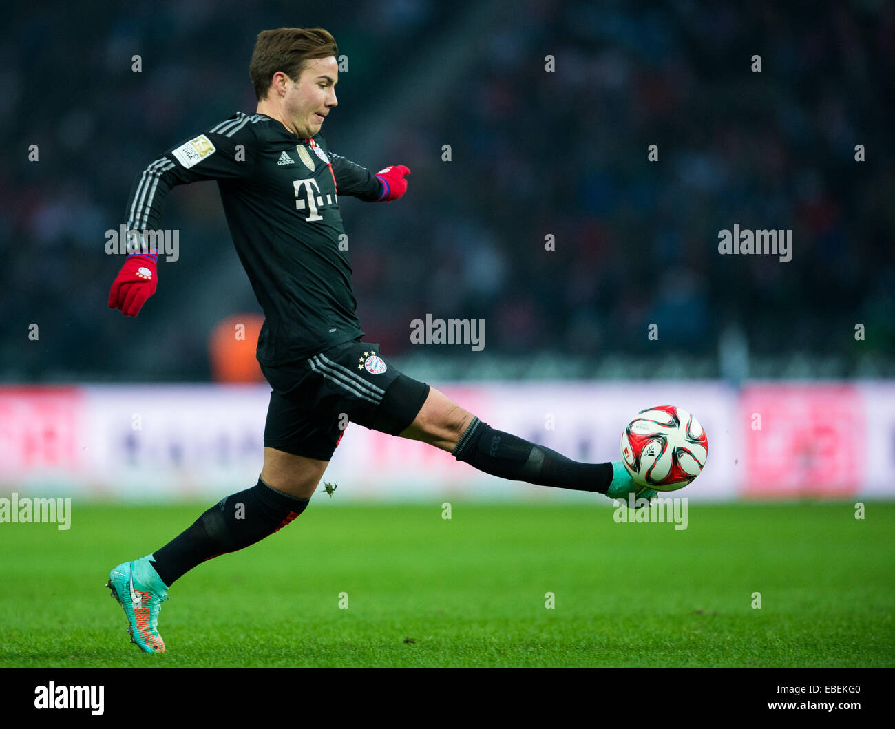 Berlin, Germany. 29th Nov, 2014. Munich's Mario Goetze plays the ball ...