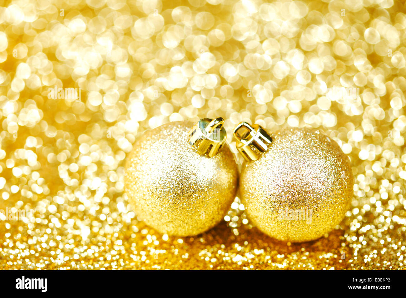 Golden christmas balls on shining glitter background close-up Stock ...