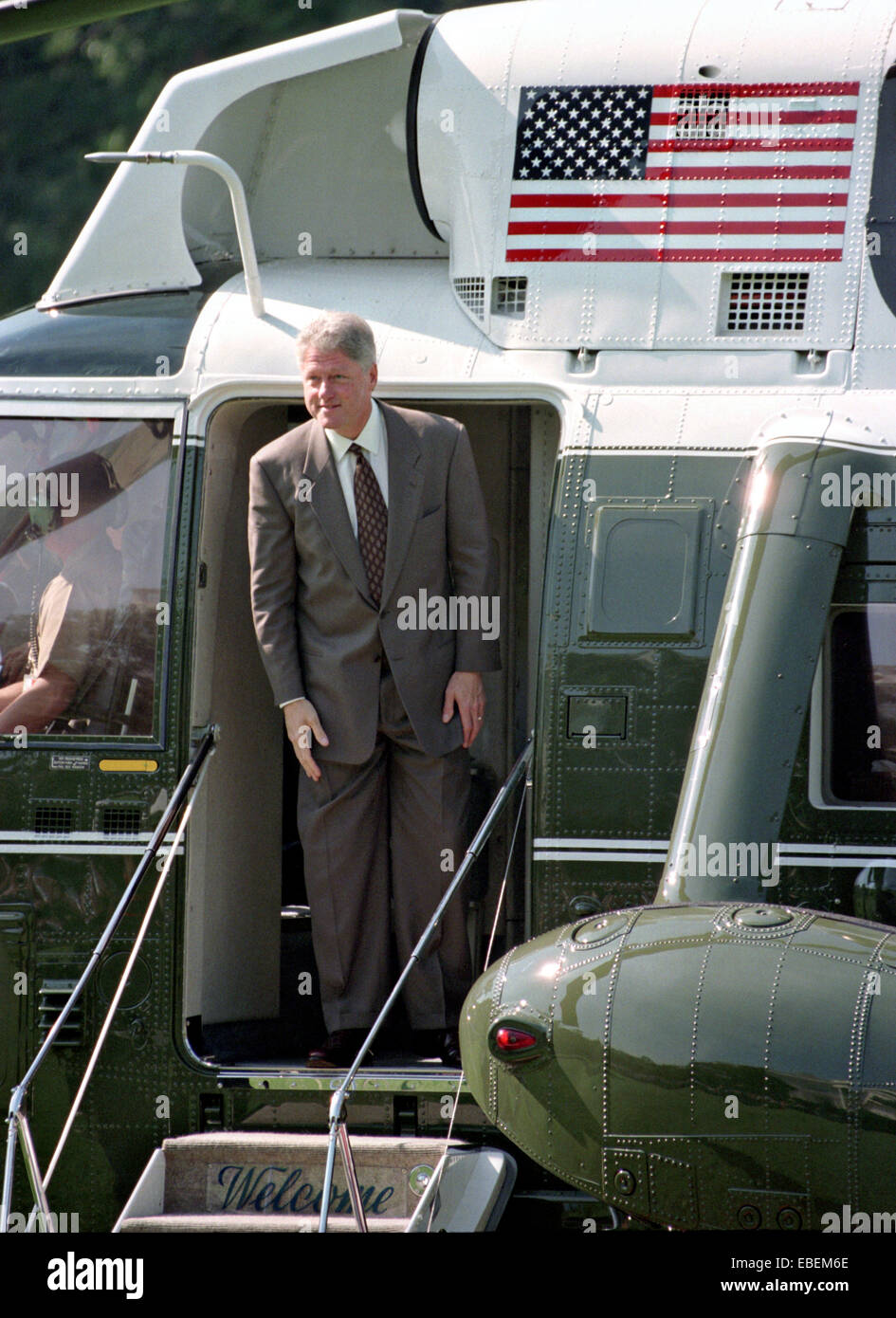 US President Bill Clinton boards Marine One helicopter as he departs ...