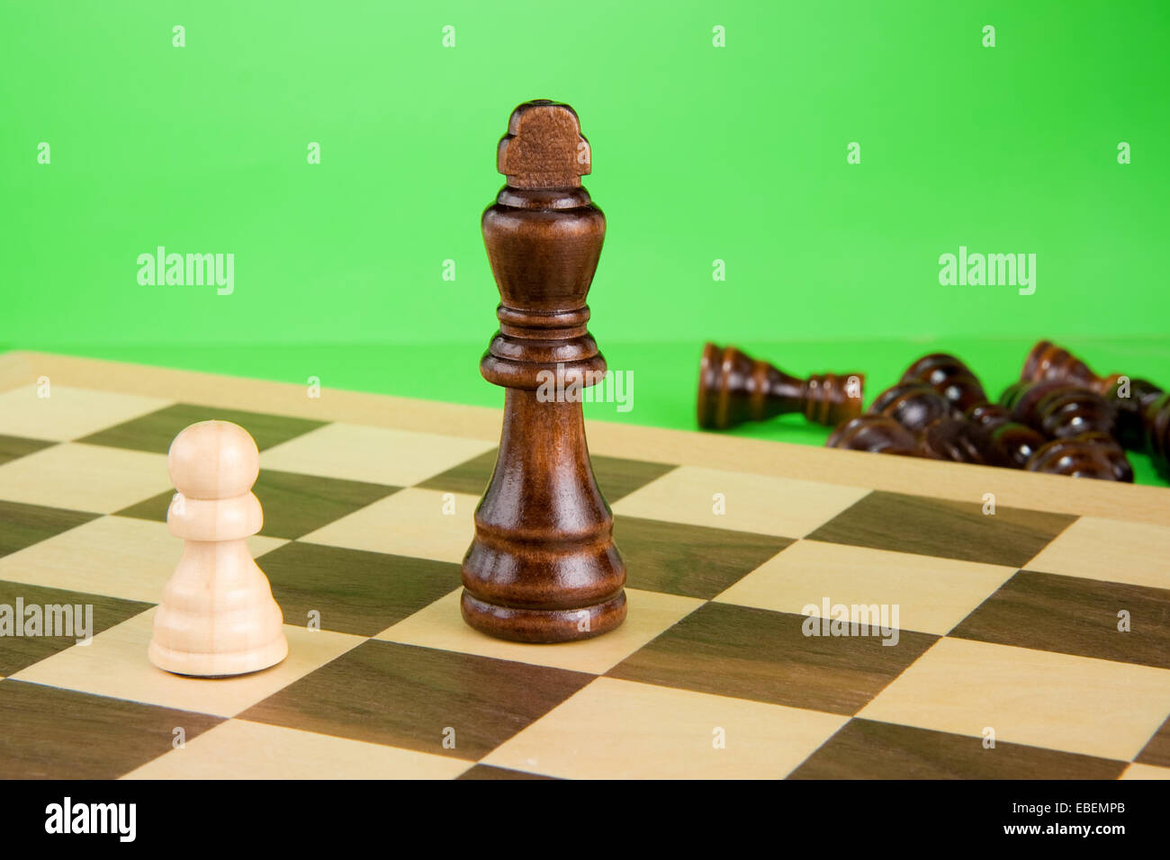 chess piece isolated on green background Stock Photo - Alamy