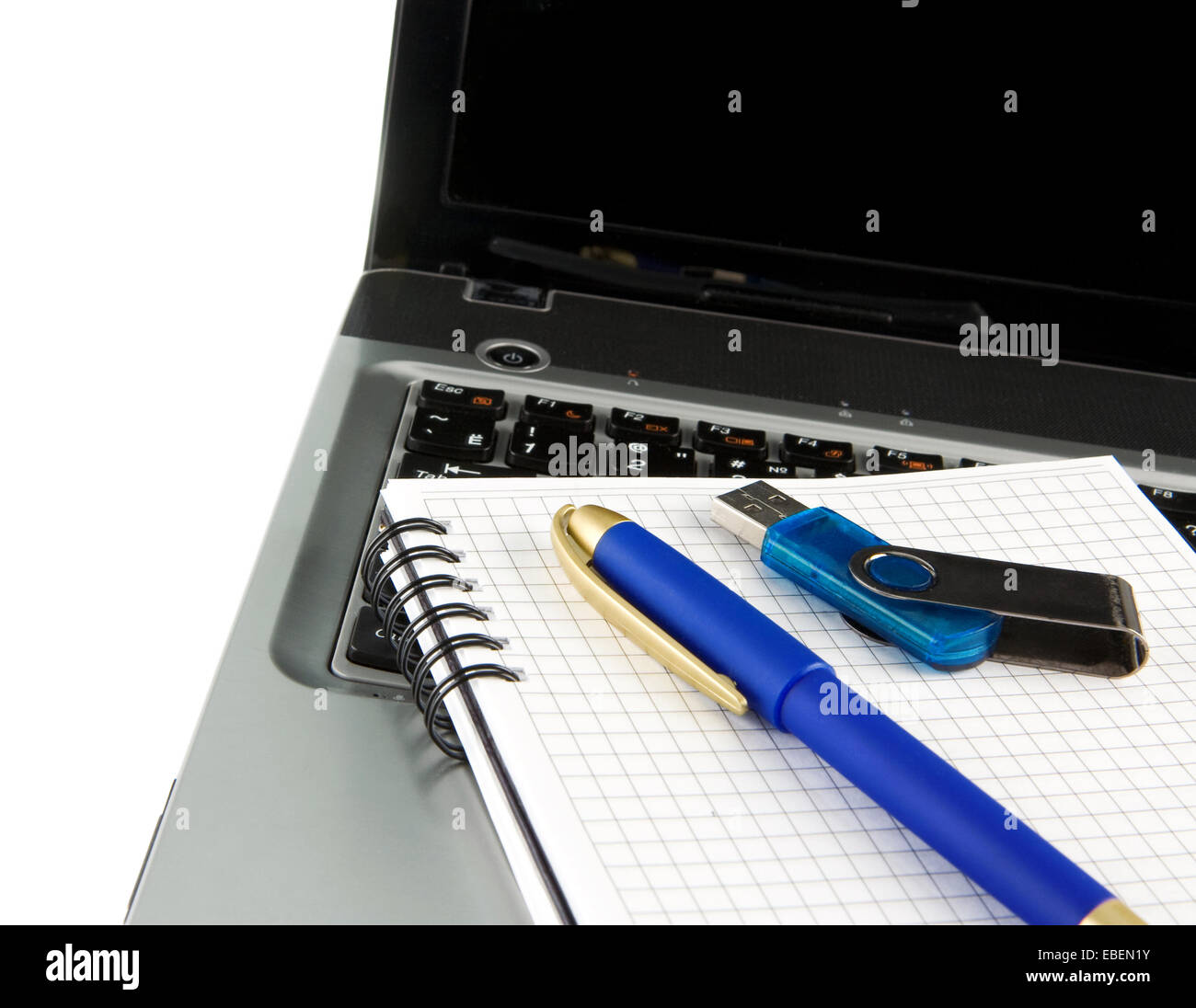 notebook laptop and pen isolated on white background Stock Photo - Alamy