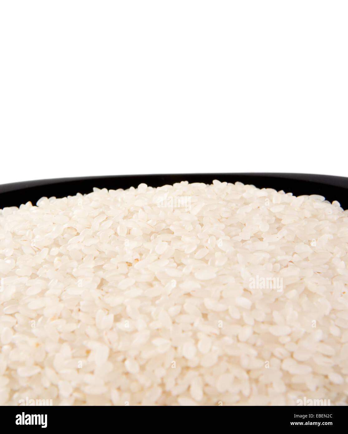 rice and black plate isolated on white background Stock Photo - Alamy