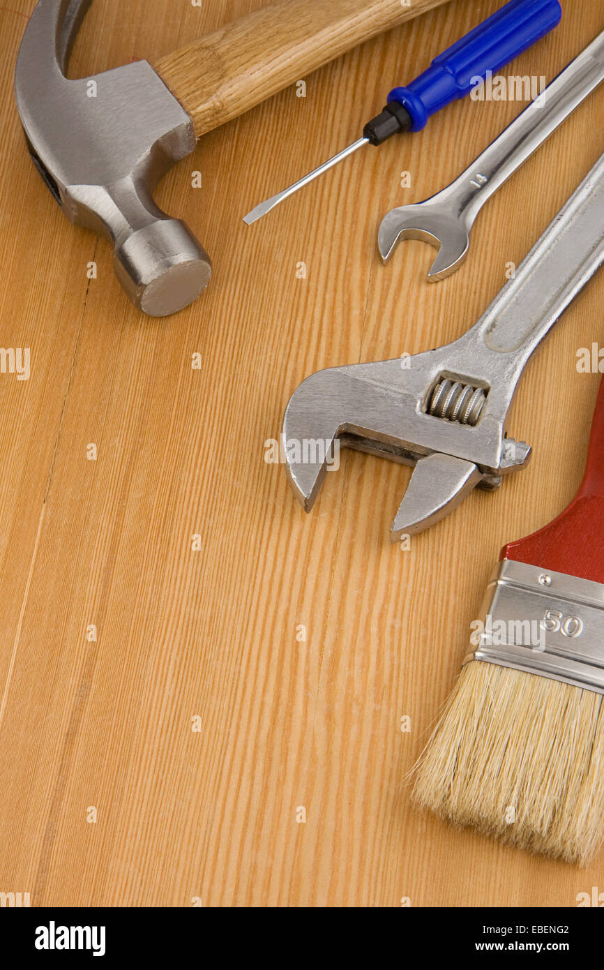 set of tools and instruments on wooden texture Stock Photo - Alamy