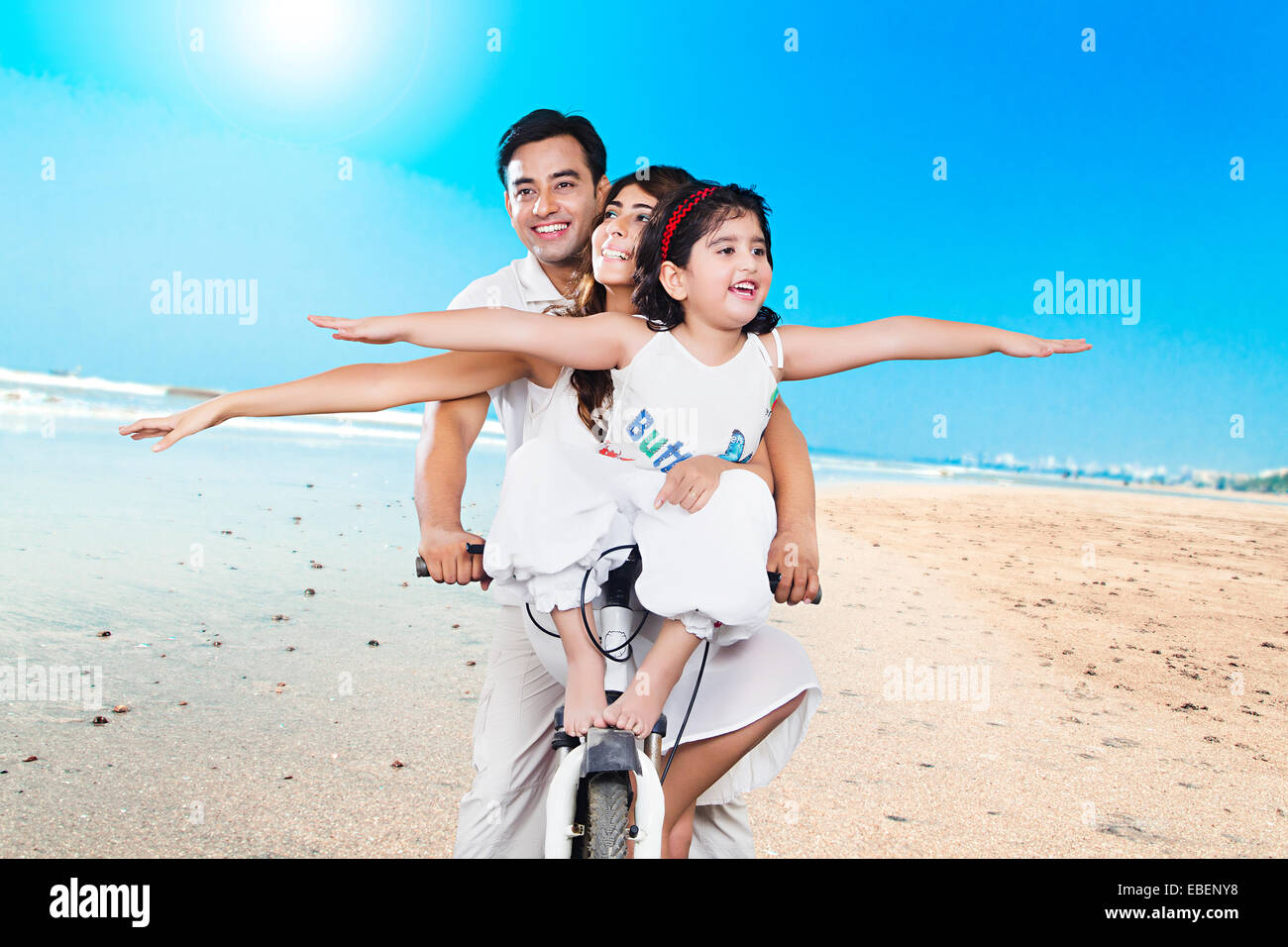 Parent child cycle holding hi-res stock photography and images - Alamy
