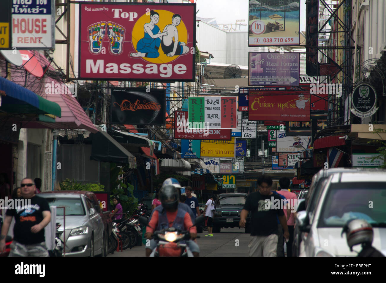 Street bars and massage parlor on a small soi in Pattaya, Thailand ...