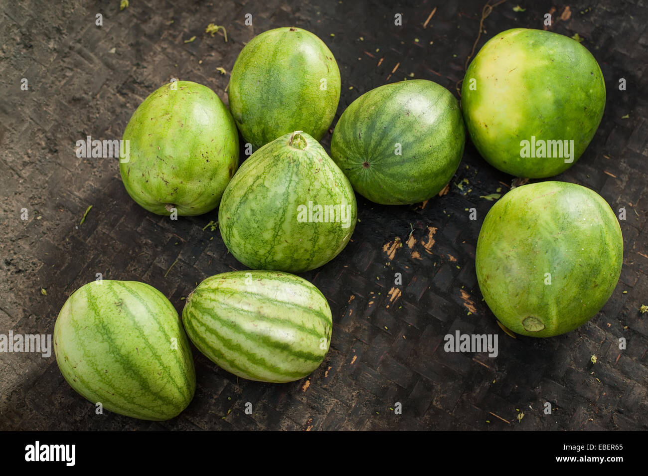 Organic oriental melons for sale at outdoor asian marketplace. Food ...
