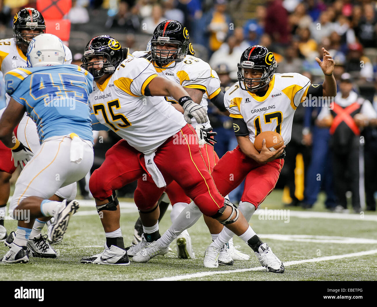 Grambling State Tigers quarterback Johnathan Williams (17) scrambles ...
