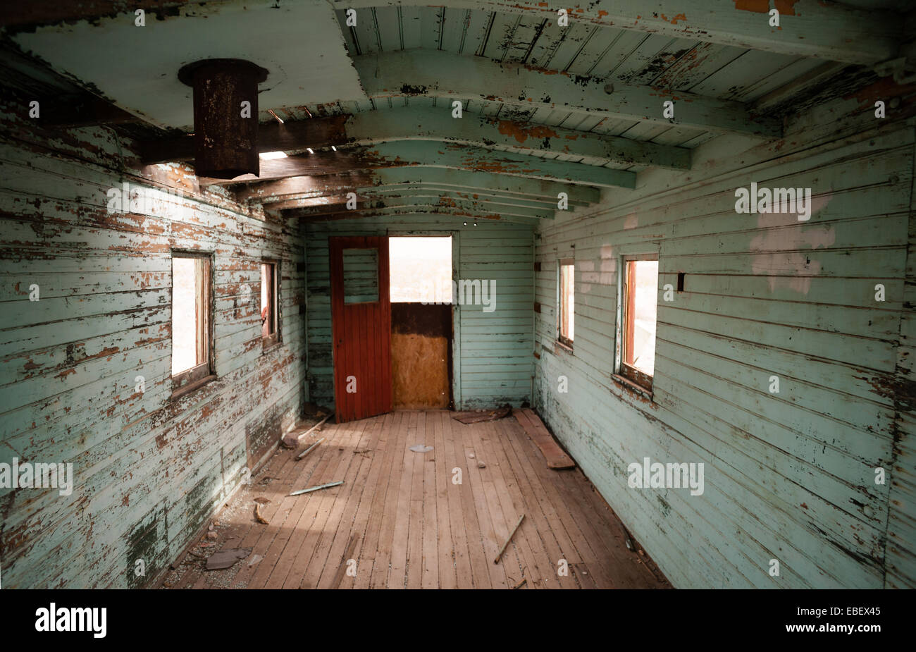 The view inside an abandoned railroad caboose car Stock Photo - Alamy