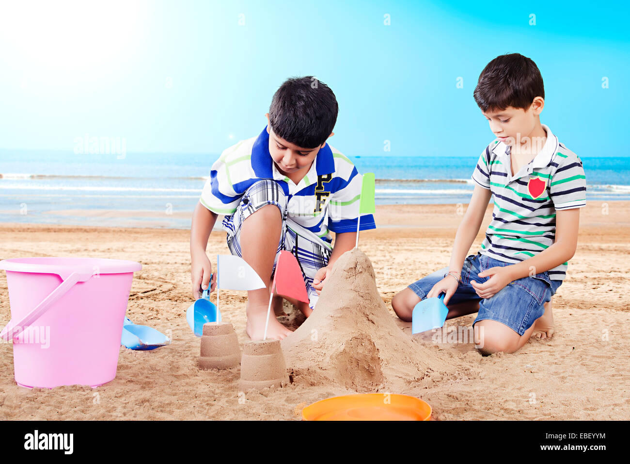 indian Child goa beach playing Sand Castle Stock Photo - Alamy