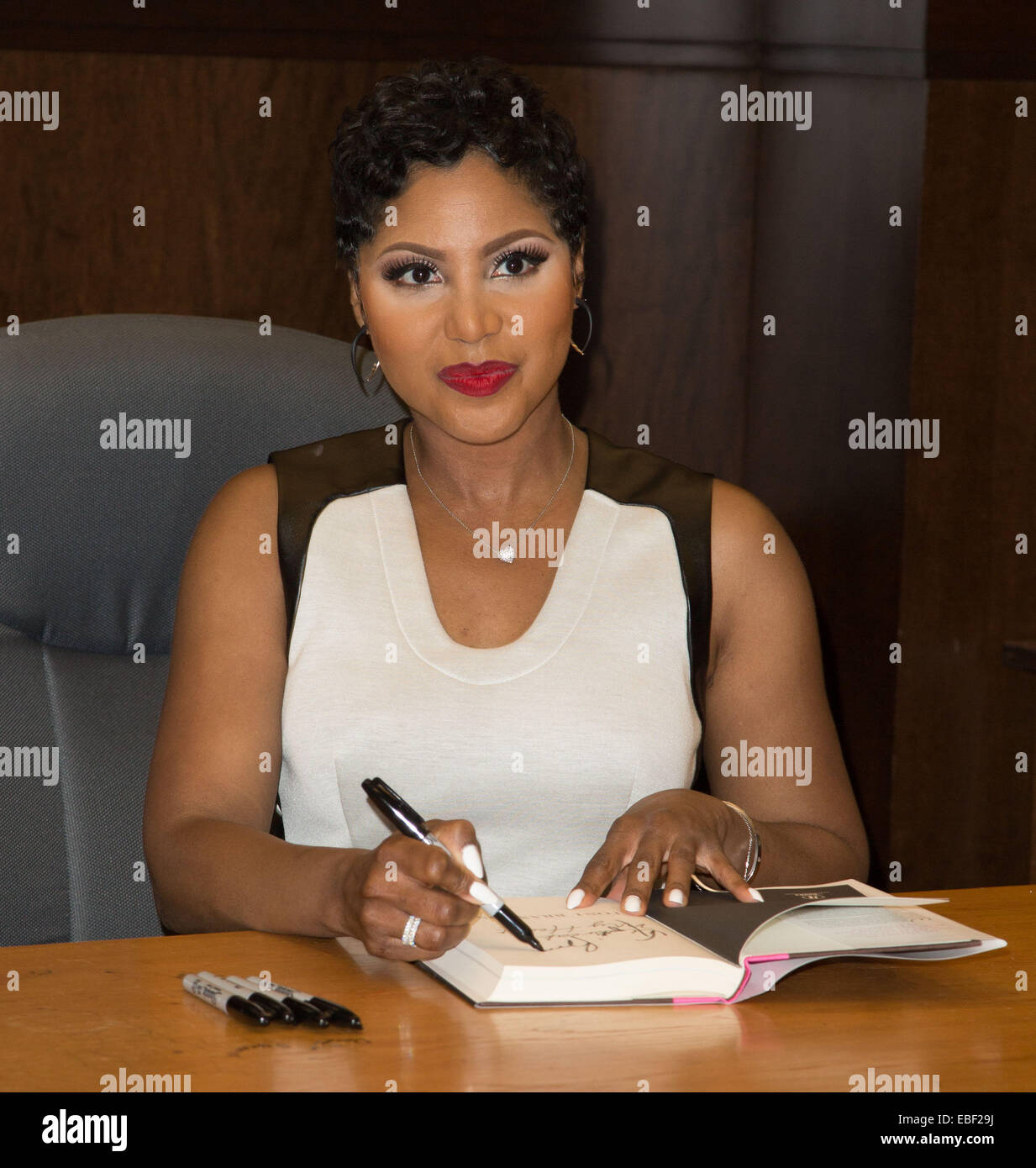 Recording artist Toni Braxton signs copies of her book 'Unbreak My ...