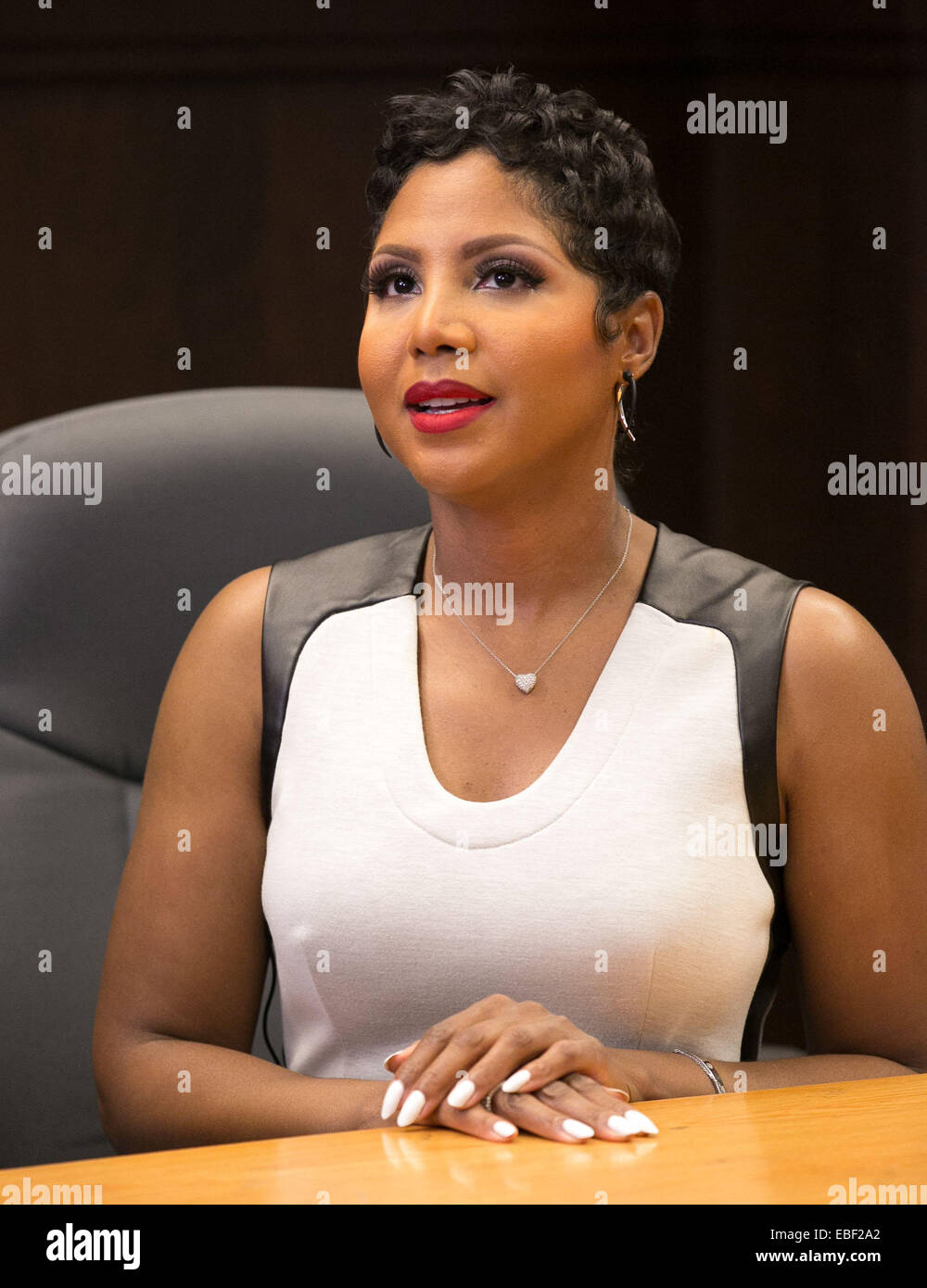 Recording artist Toni Braxton signs copies of her book 'Unbreak My ...
