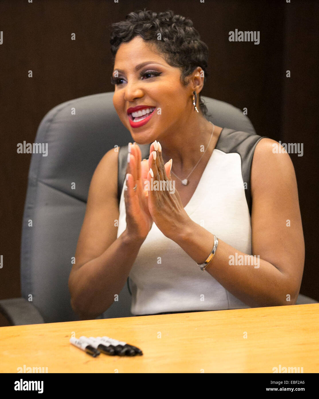 Recording artist Toni Braxton signs copies of her book 'Unbreak My ...
