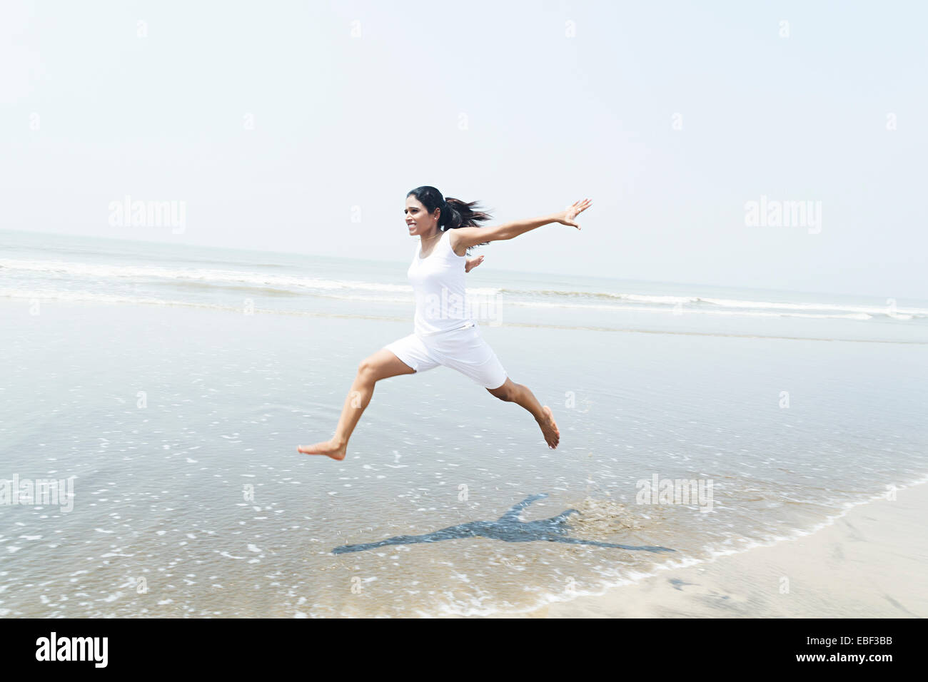 Indian lady beach running hi-res stock photography and images - Alamy